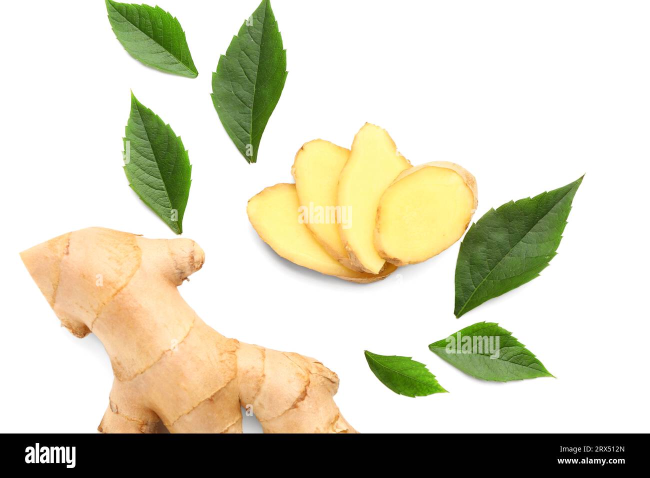 Fresh ginger root and leaves on white background Stock Photo - Alamy