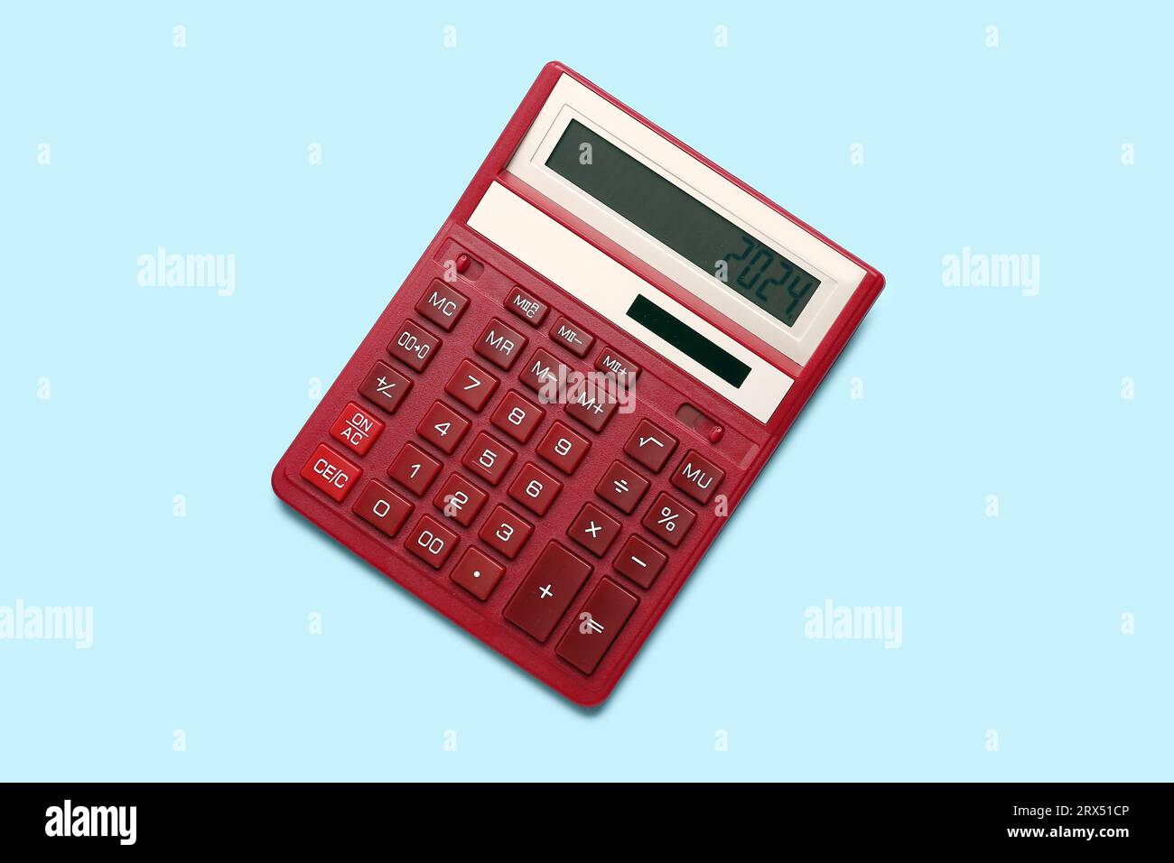 Calculator with number 2024 on blue background Stock Photo - Alamy