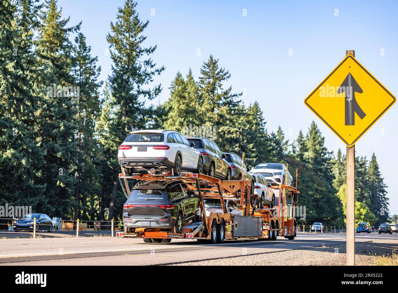 Bright orange industrial standard car hauler classic carrier big rig ...