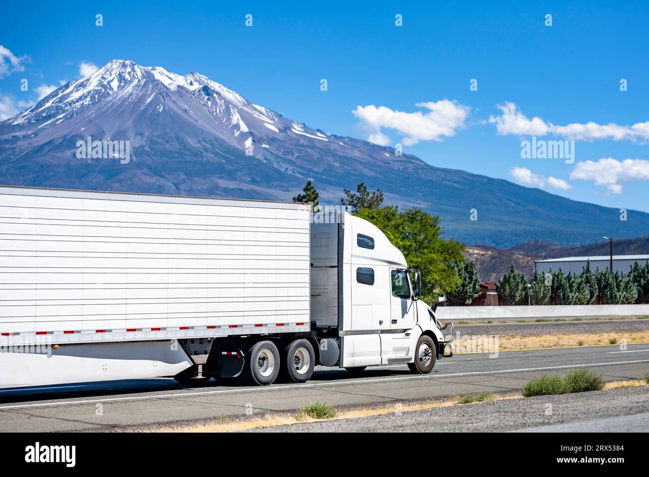 Industrial long hauler carrier white big rig semi truck tractor with ...