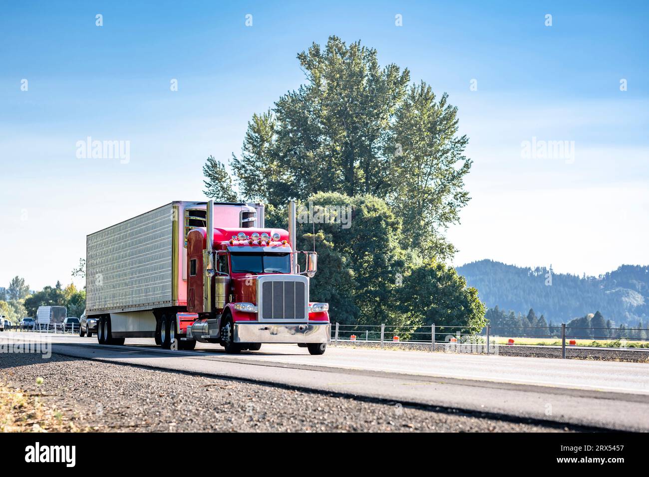 Industrial long hauler classic carrier red big rig semi truck tractor ...