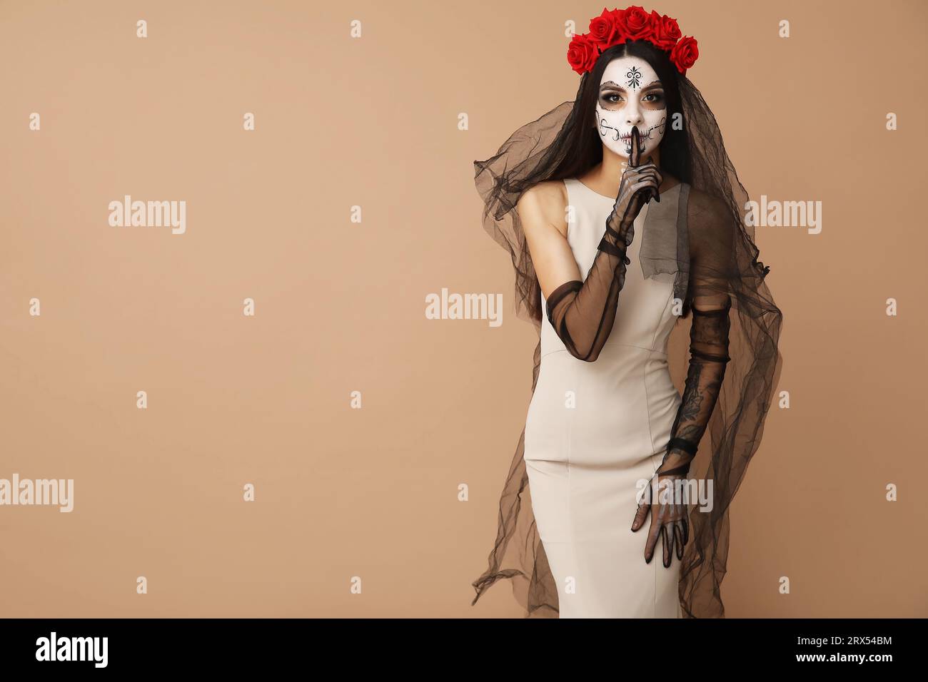 Beautiful young woman dressed as dead bride for Halloween party showing ...