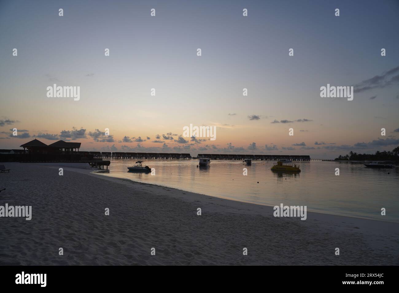 Beach Ocean Green Boats Maldives Stock Photo - Alamy