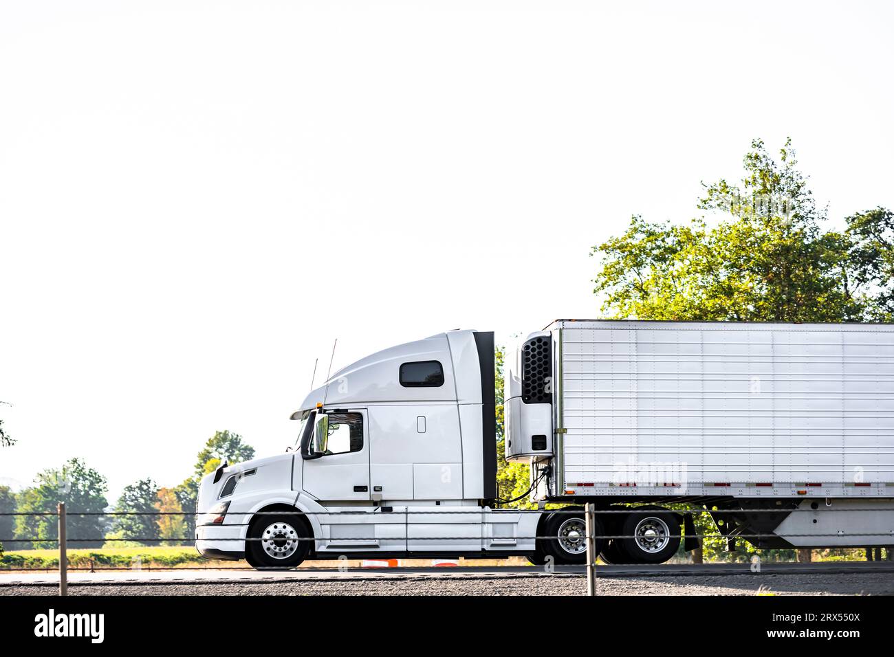 Industrial long hauler carrier white big rig semi truck tractor with ...