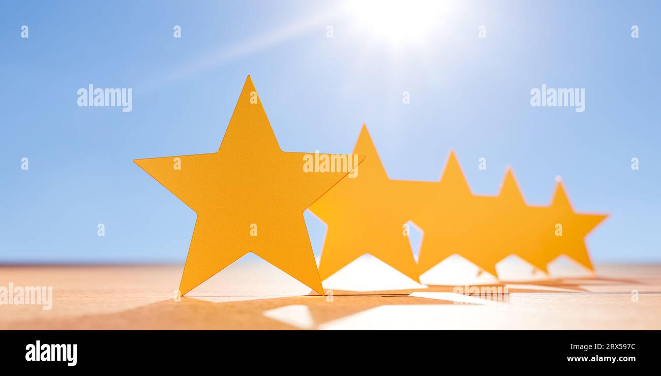 5 Five stars on table, blue sky background. five star icon for feedback ...