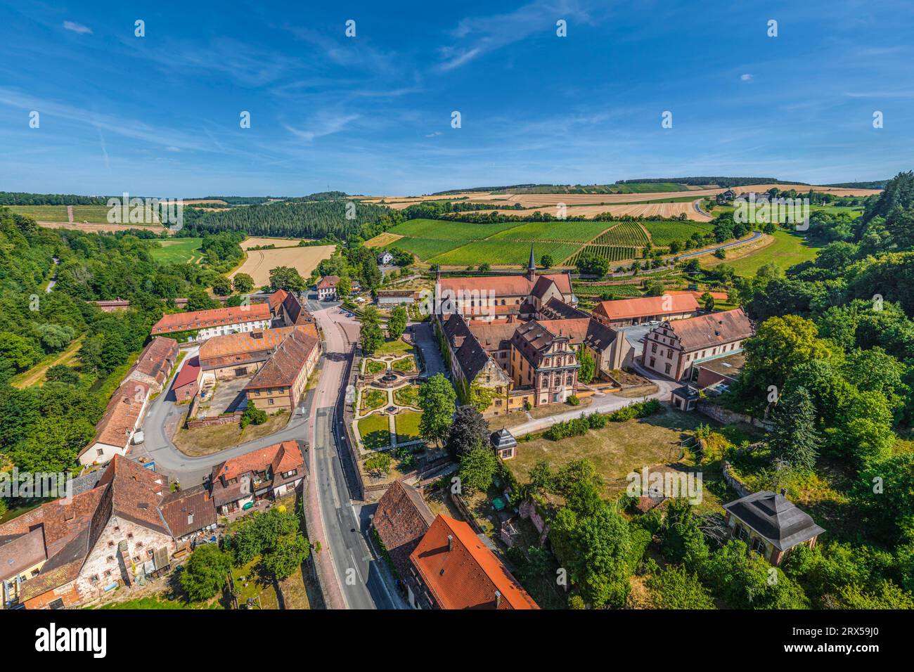 Aerial view to the Monastry of Bronnbach in the Tauber valley between ...