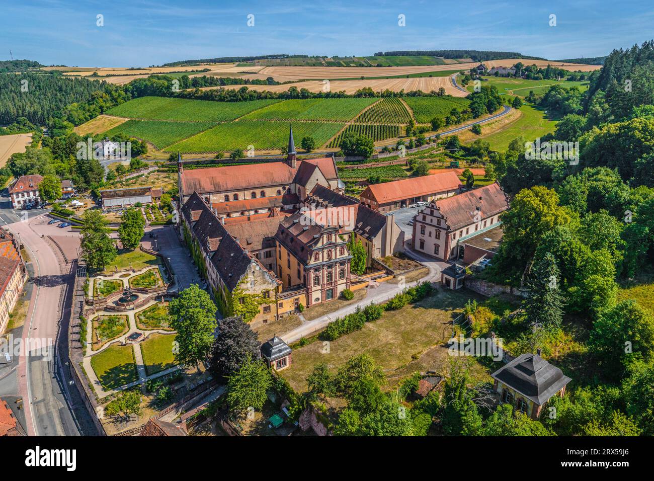 Aerial view to the Monastry of Bronnbach in the Tauber valley between ...