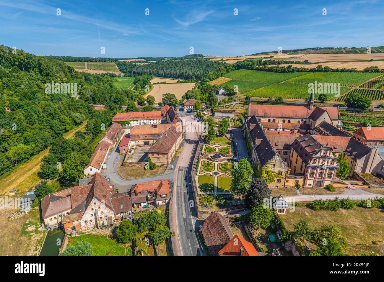 Aerial view to the Monastry of Bronnbach in the Tauber valley between ...