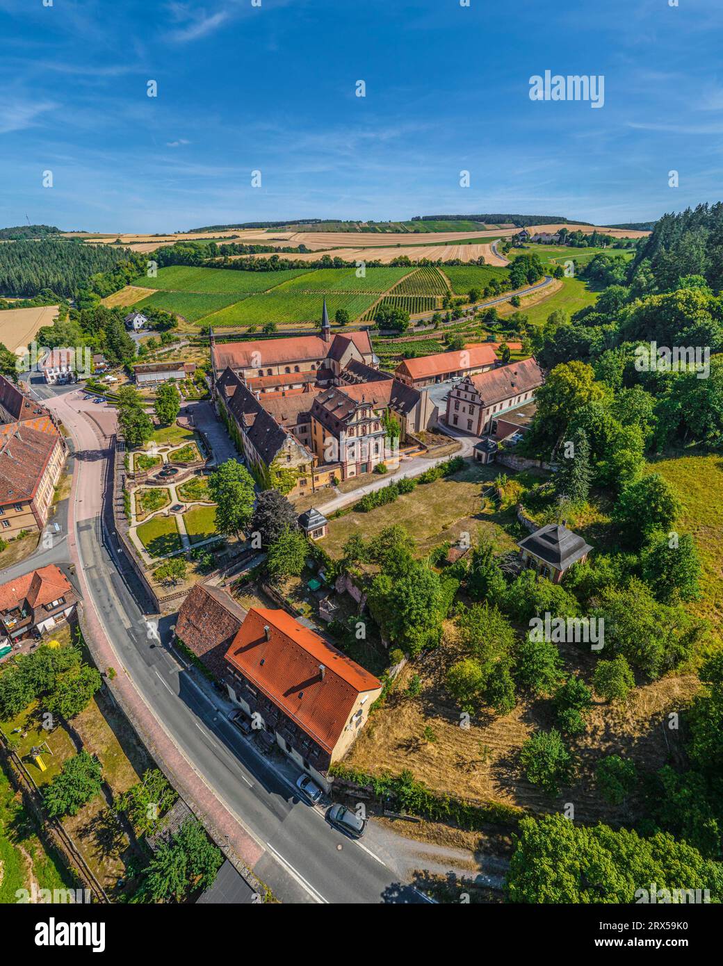 Aerial view to the Monastry of Bronnbach in the Tauber valley between ...