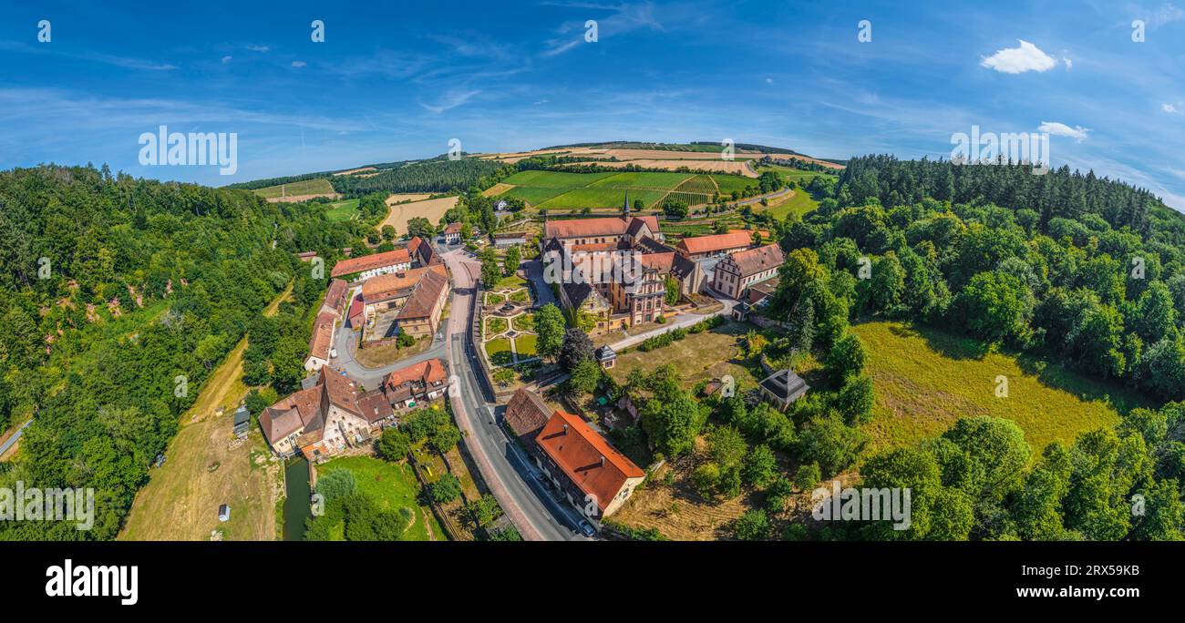 Aerial view to the Monastry of Bronnbach in the Tauber valley between ...