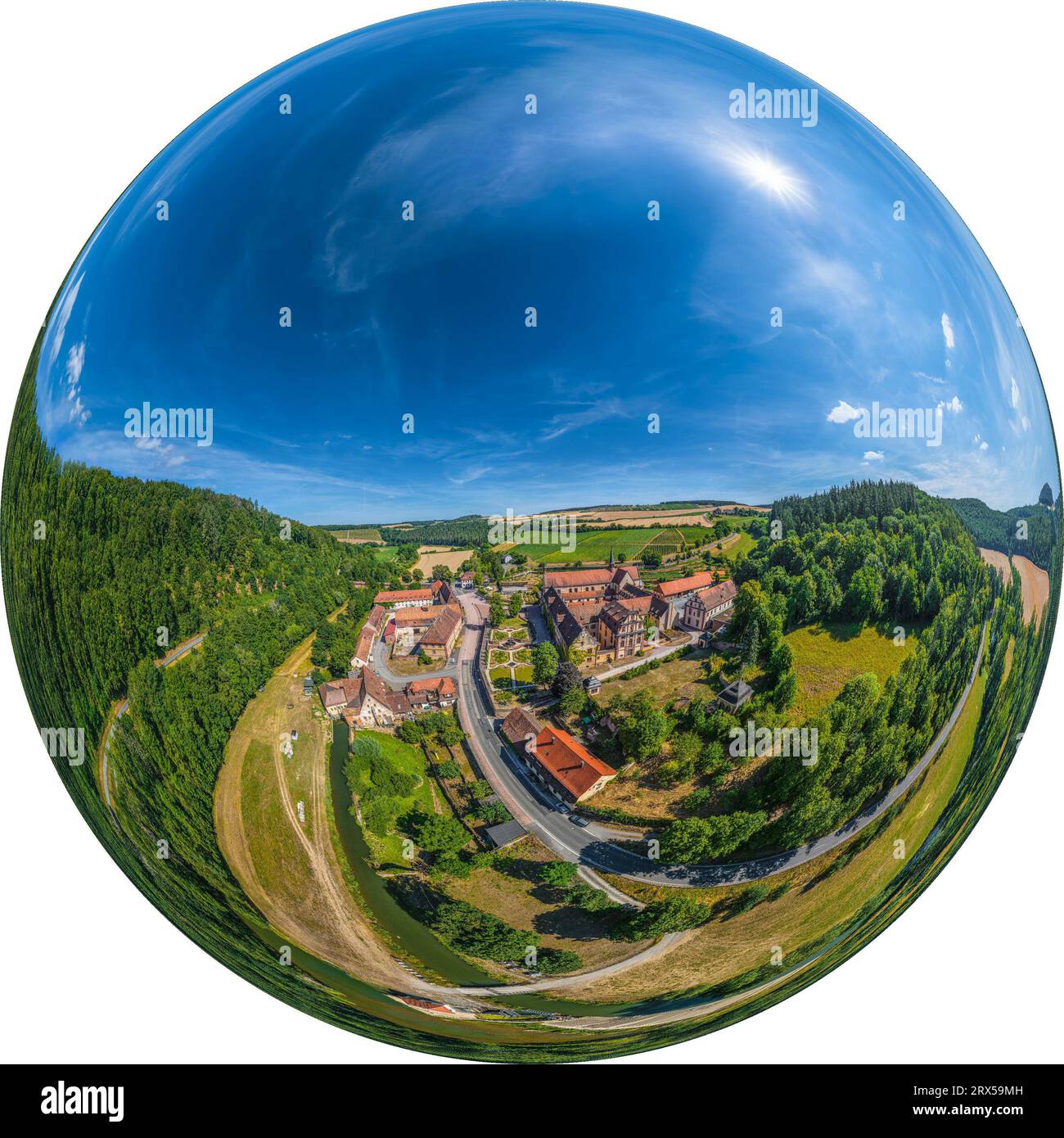 Aerial view to the Monastry of Bronnbach in the Tauber valley between ...