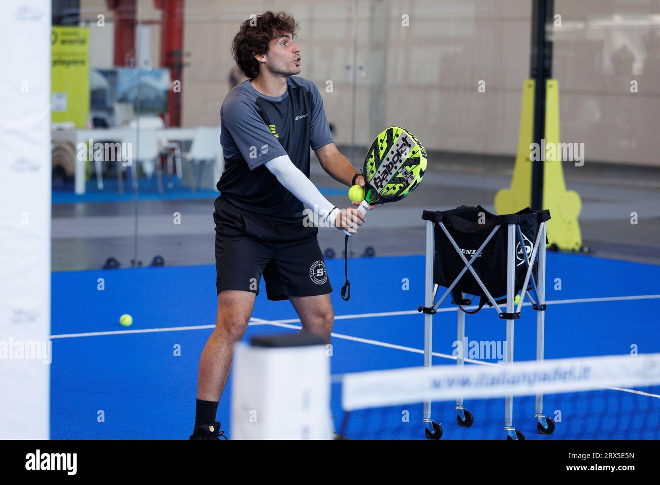 Padel Instructor Teaching the Game Techniques Stock Photo - Alamy