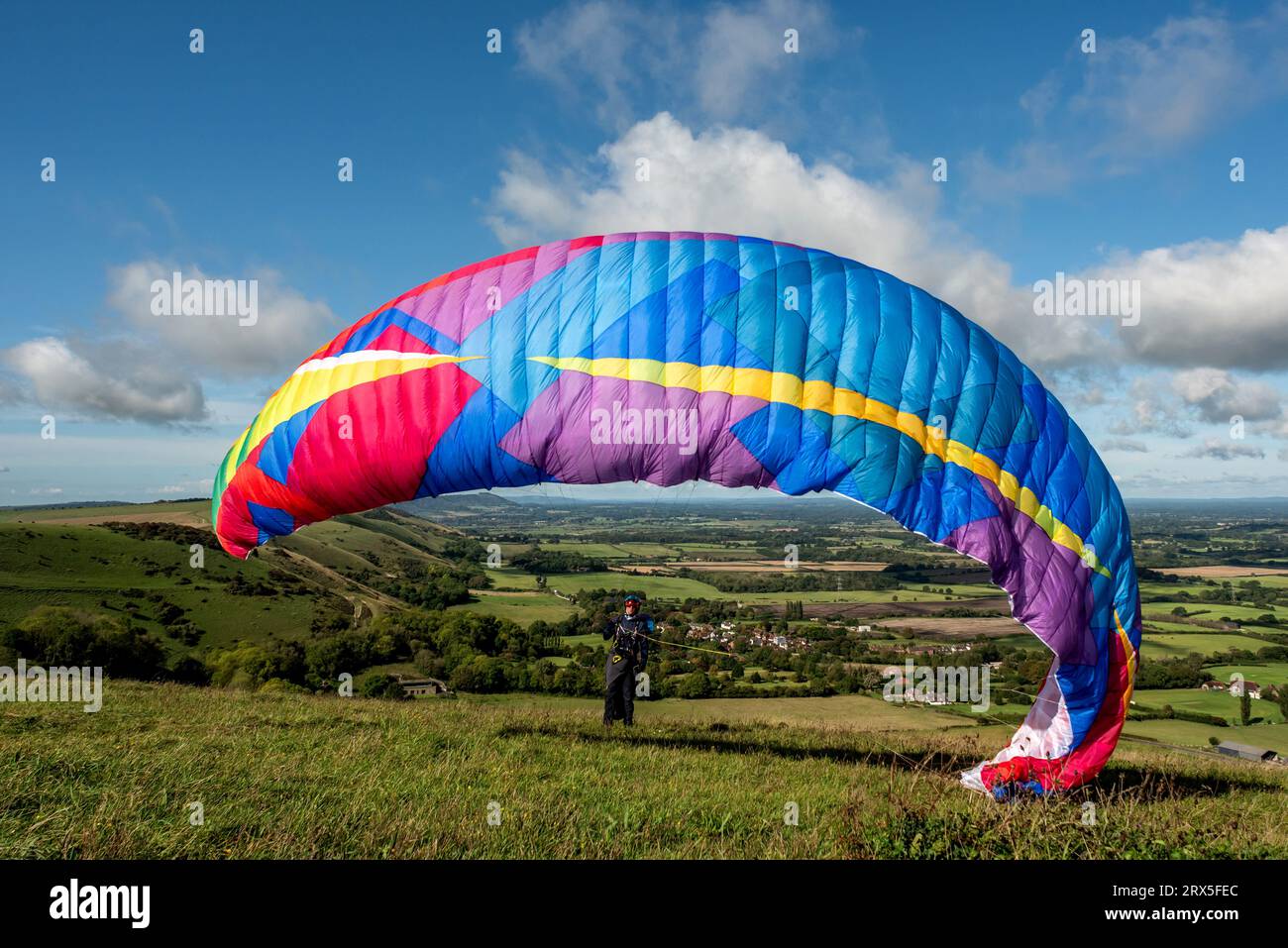 Brighton, September 22nd 2023: A parascender taking off from Devil's ...