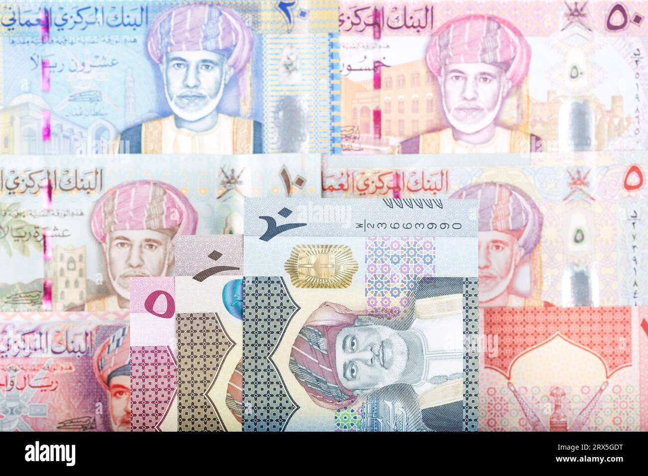 Omani money - rial a business background Stock Photo - Alamy