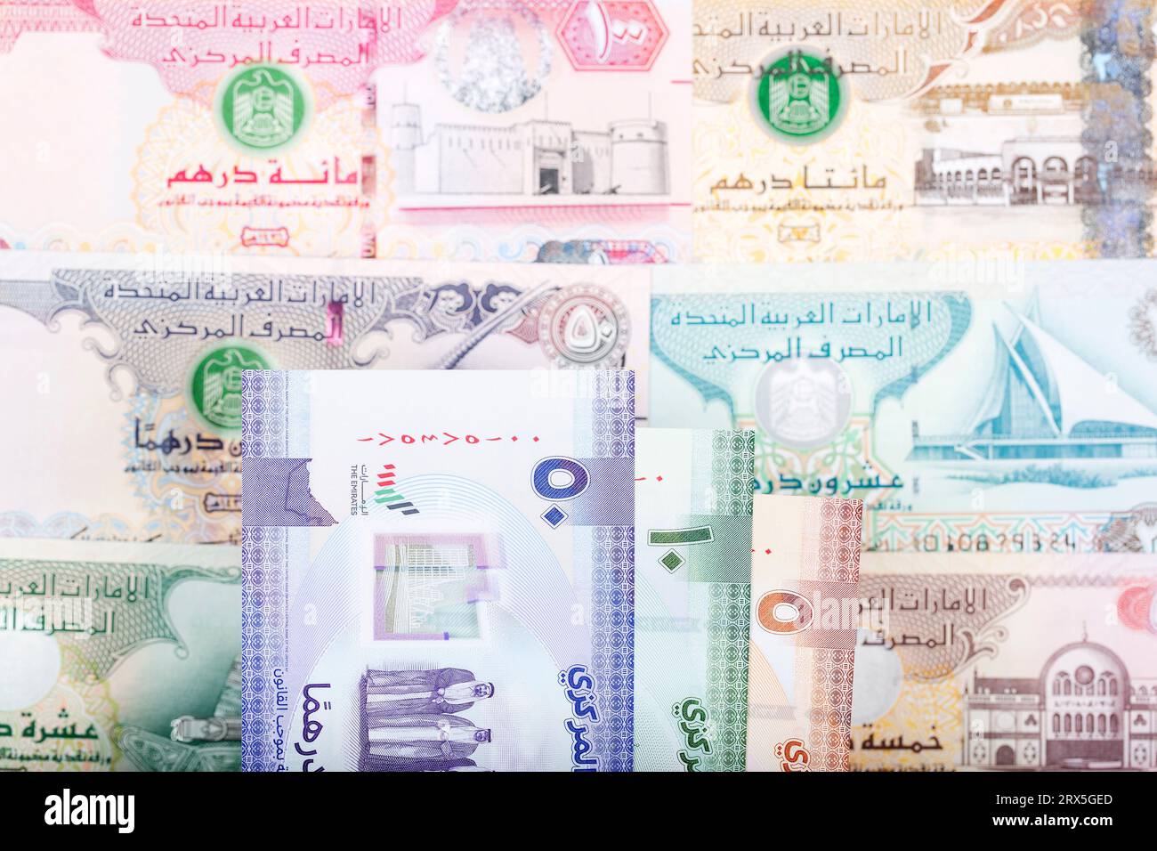 United Arab Emirates money - dirham a business background Stock Photo ...