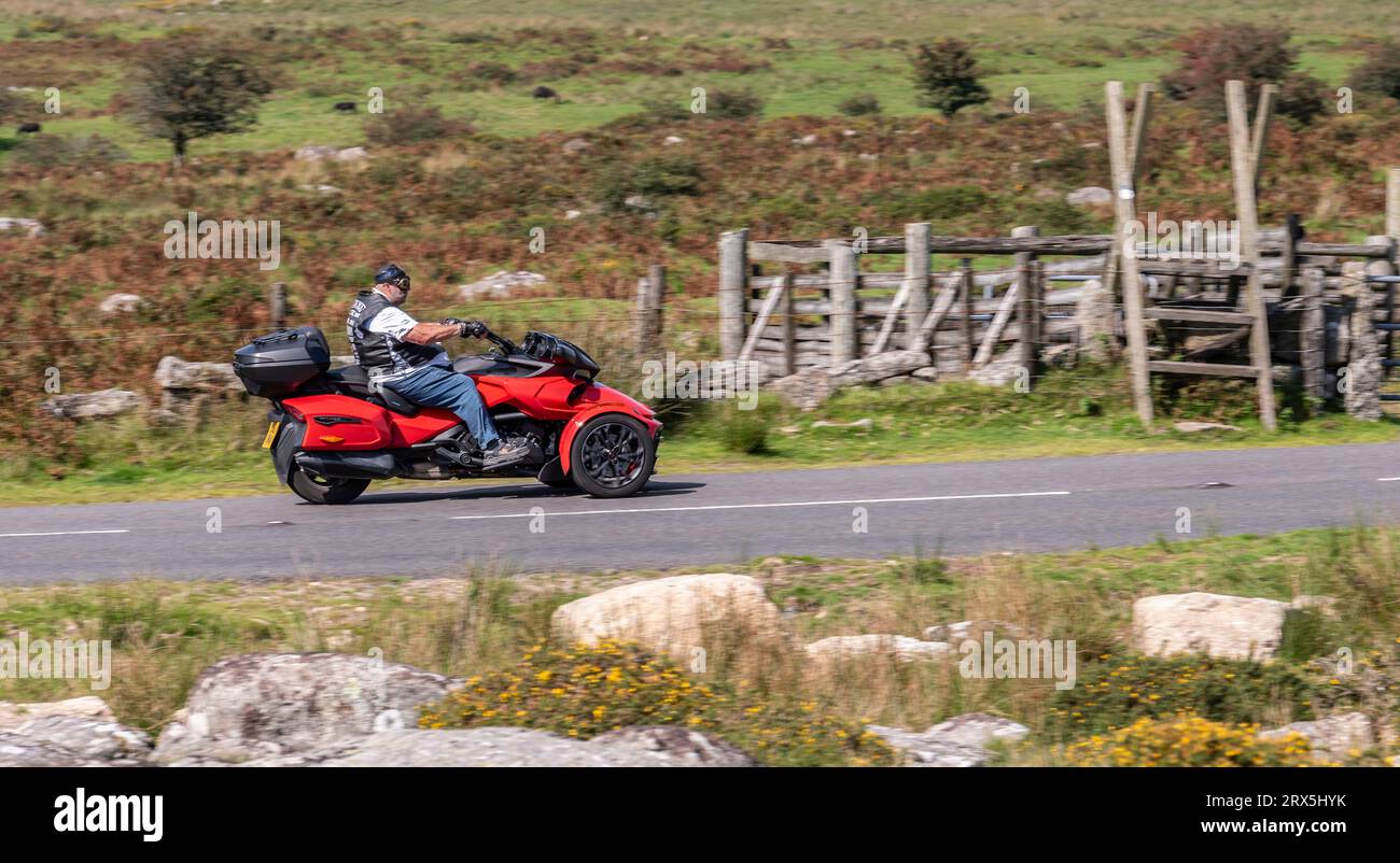 Dartmoor, Devon, Enggland, UK. 3 September 2023. Trike rider riding his ...