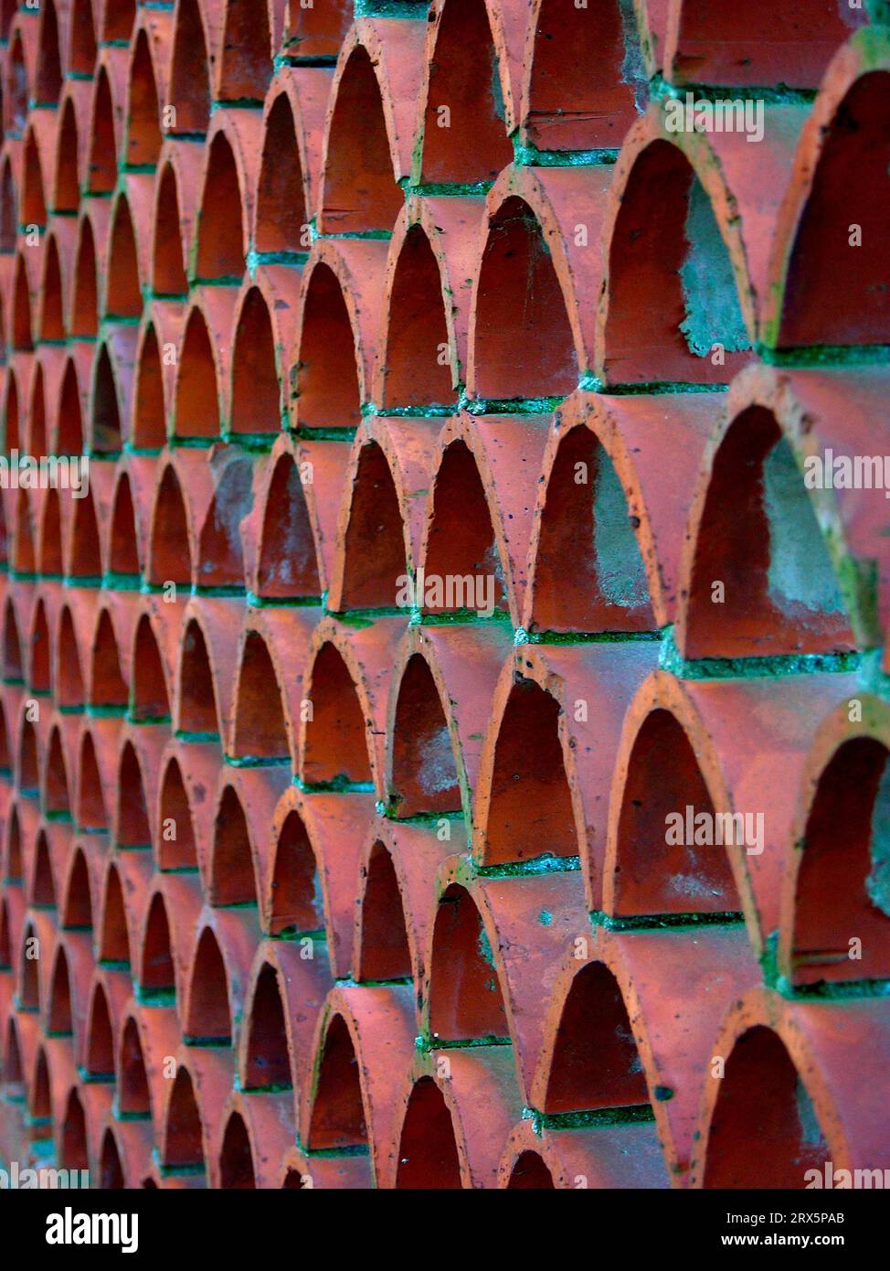 Brick wall made of round bricks, curved pointing bricks, Italy Stock ...
