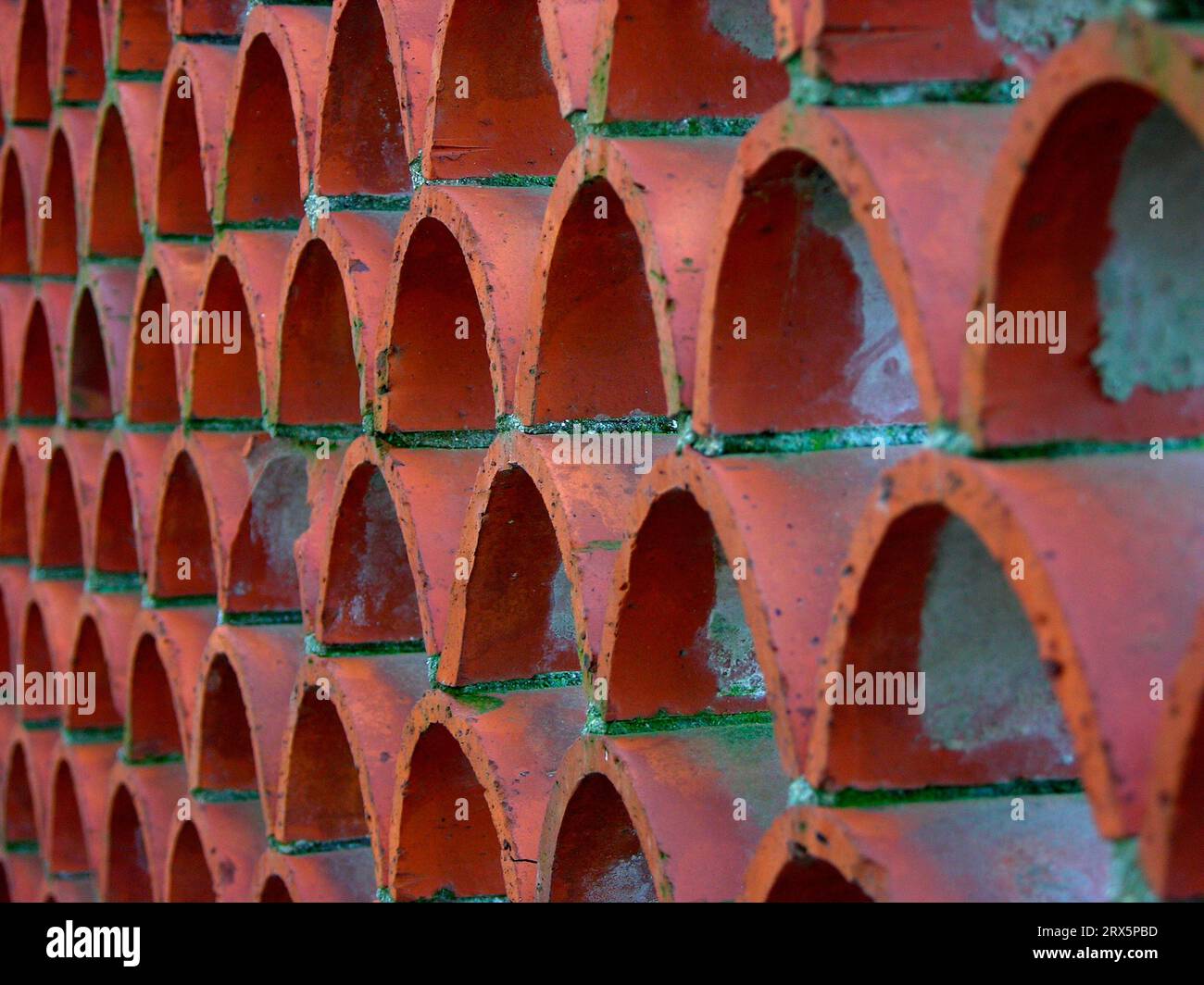 Brick wall made of round bricks, curved pointing bricks, Italy Stock ...