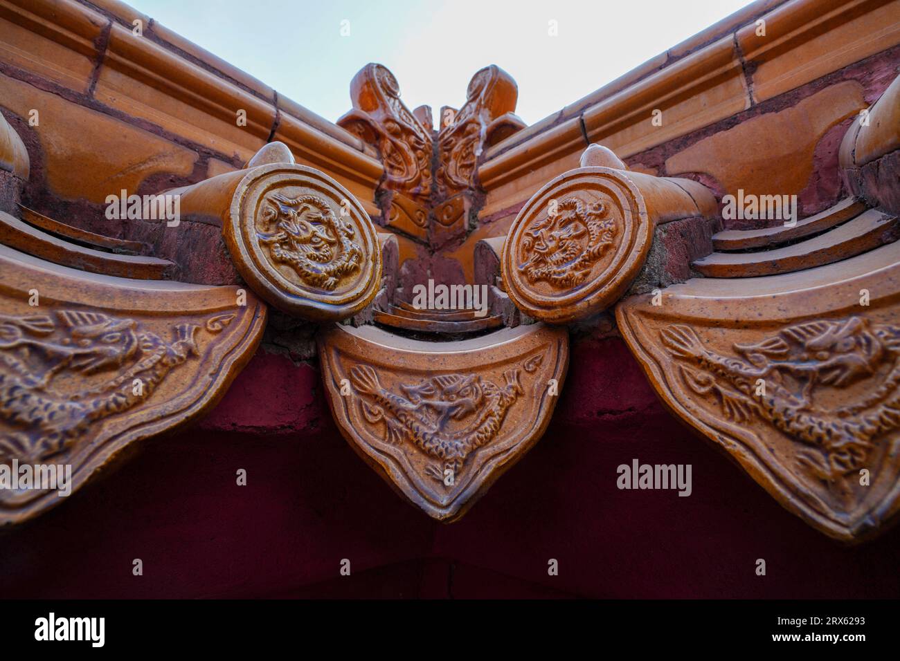 Yellow Chinese glazed roof tile dragon head architecture of Huangtangzi ...