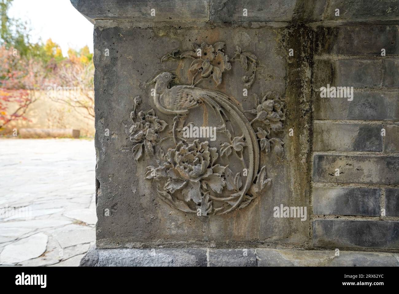 Brick carvings on the wall of the flower bed of the Salar people Museum ...