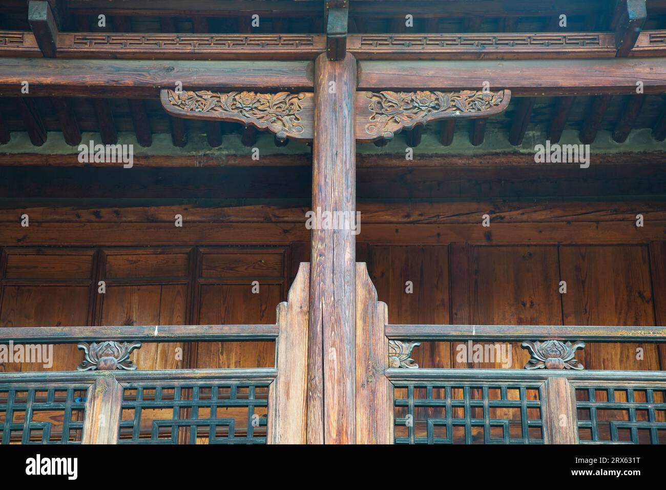 Woodcarving of the fence building of the Salar people Museum in the ...