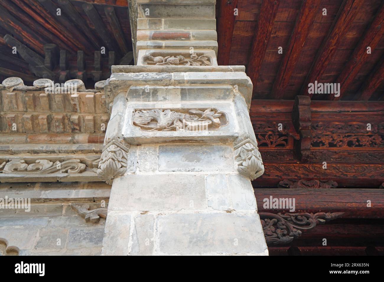 Brick carvings on the walls of the Xuanli Building of the Salar people ...
