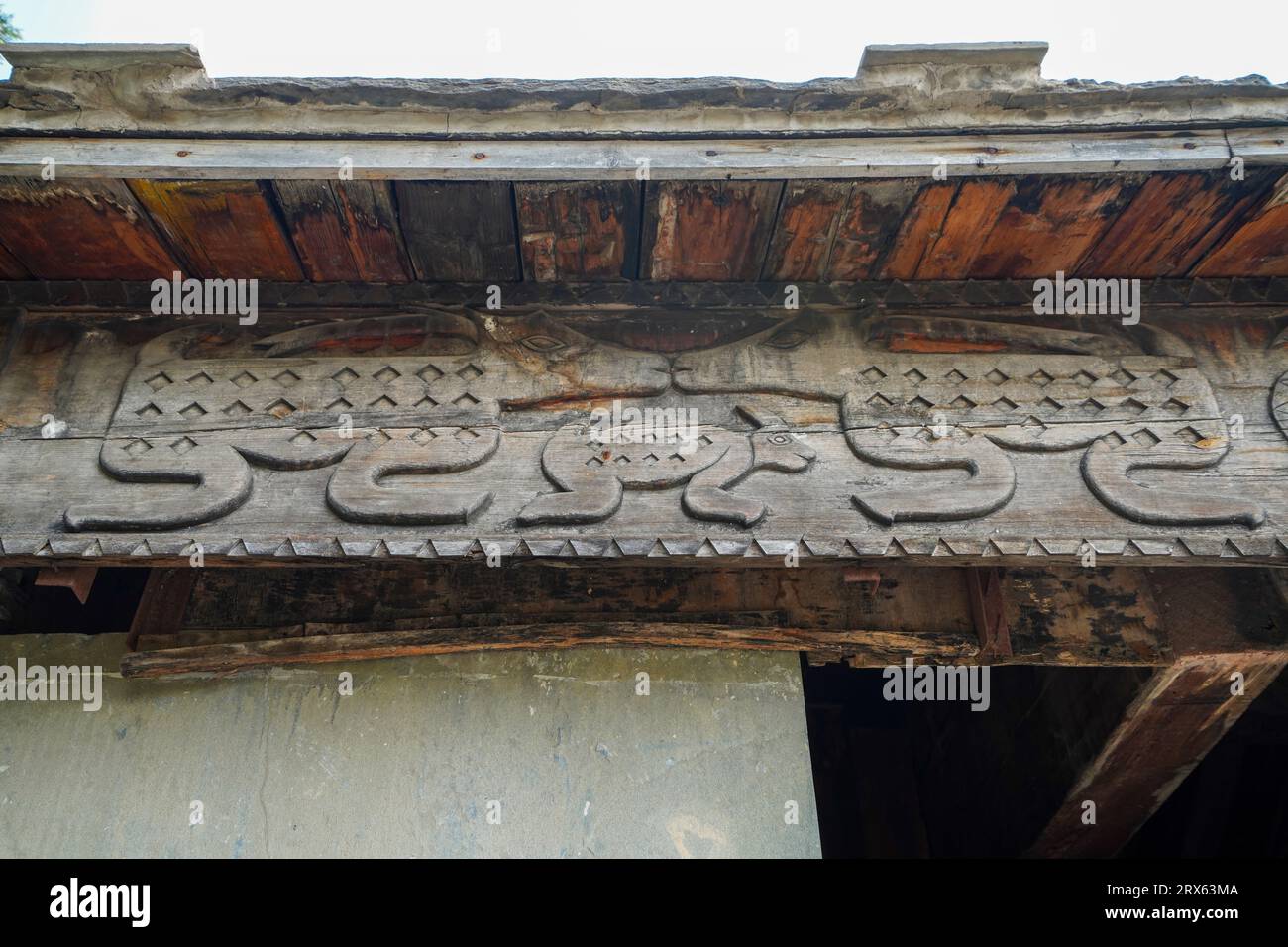 Animal Wood Carving on Paiwan Man's Slate House in Taiwan Scenic Area ...