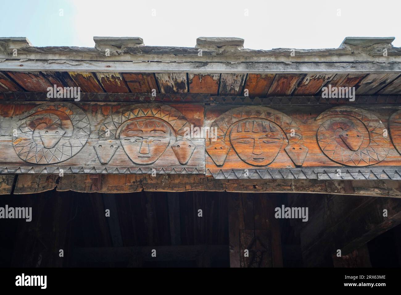 Woodcarving of figures on Paiwan people's slate houses in Taiwan Scenic ...