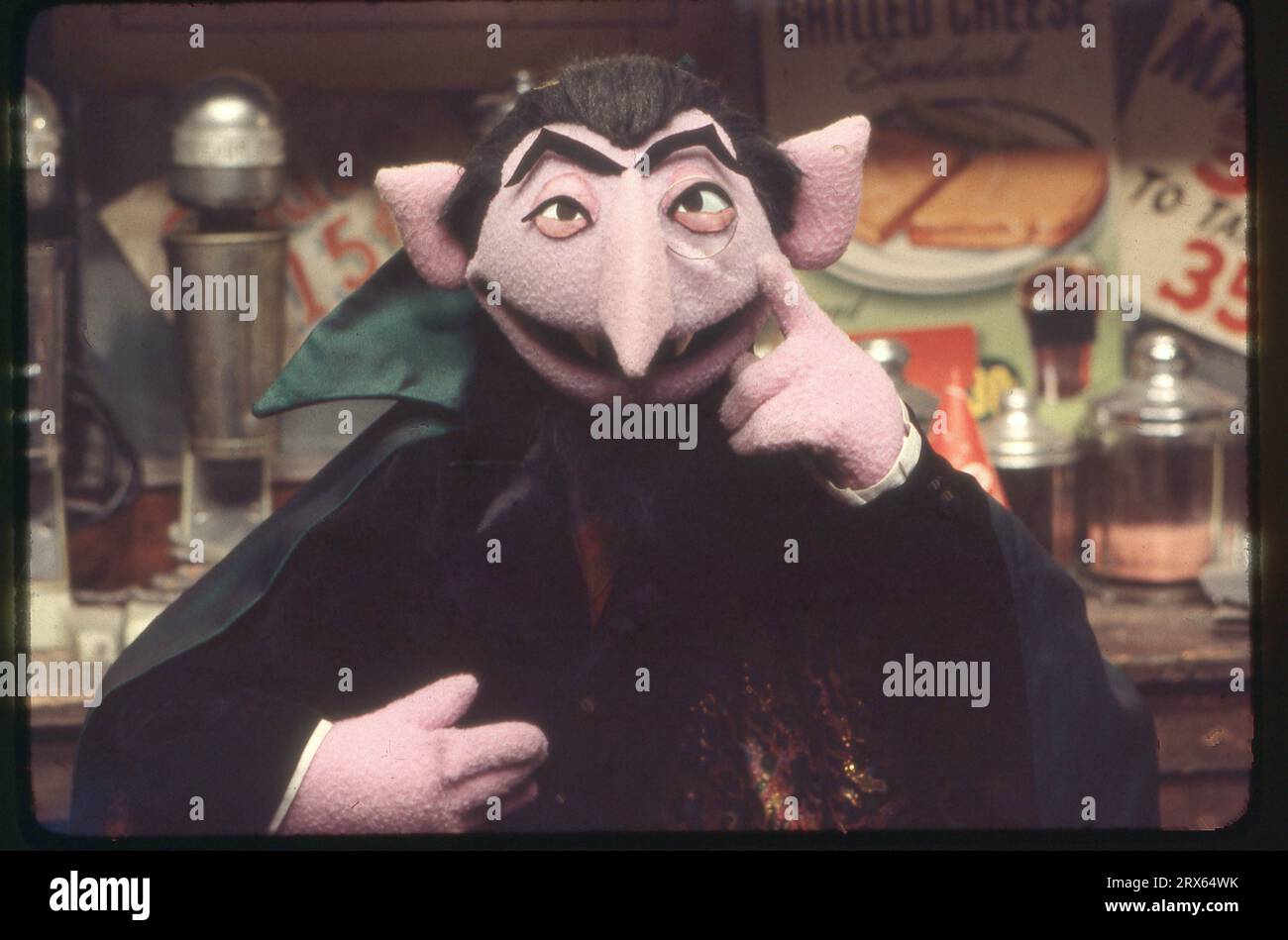 The Count kindly poses for a portrait in Mr Hooper's store. Om the set ...