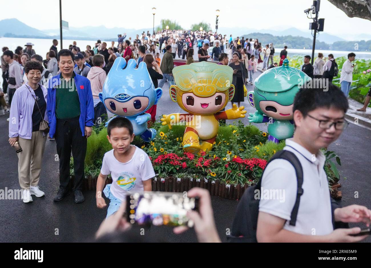 Hangzhou, China's Zhejiang Province. 23rd Sep, 2023. People pose for ...