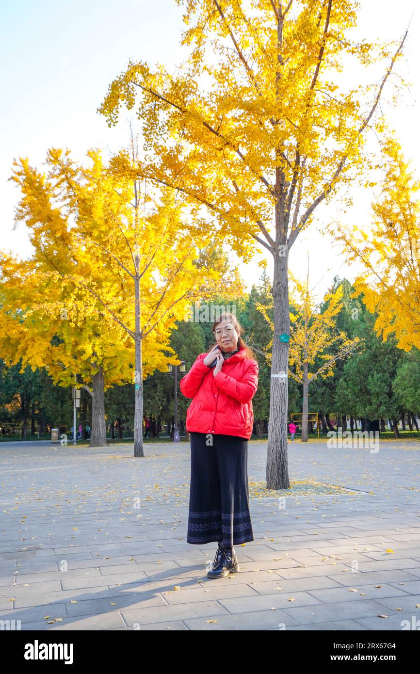 Beijing China November 4 2022 The Lady In Red At The Temple Of Heaven Park In Beijing Stock