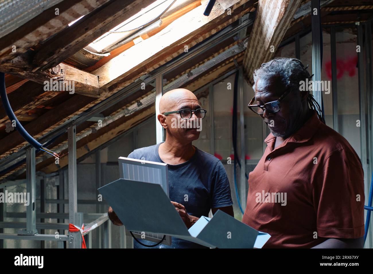 Architect construction worker documents hi-res stock photography and ...