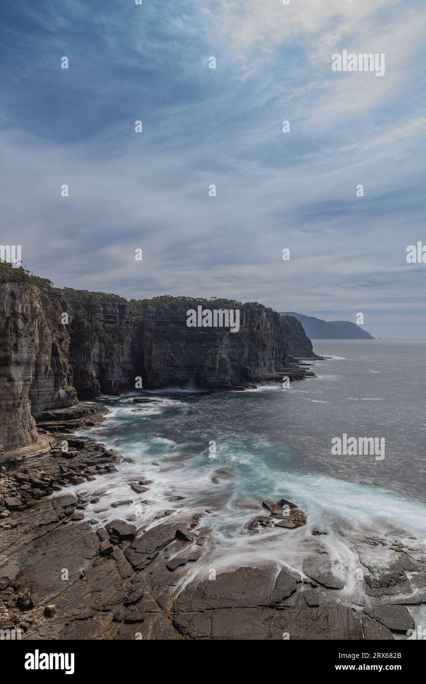 Impressive high cliff Waterfall Track located near Eaglehawk Neck ...