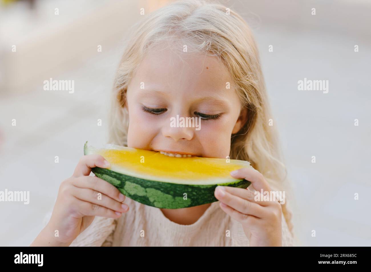 Child biting watermelon hi-res stock photography and images - Alamy