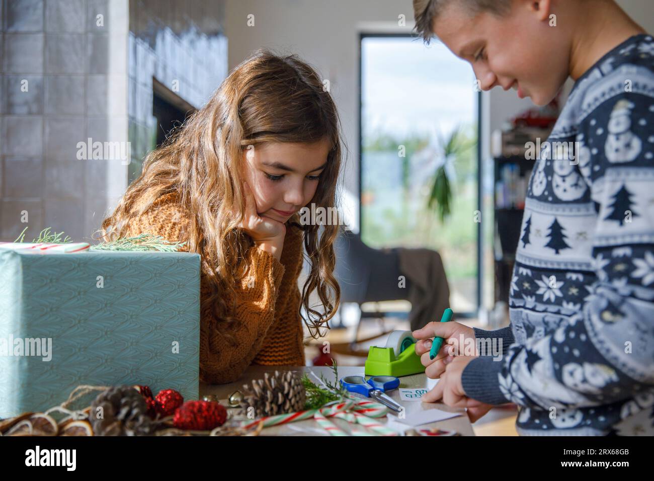 Brother and sister writing hi-res stock photography and images - Alamy