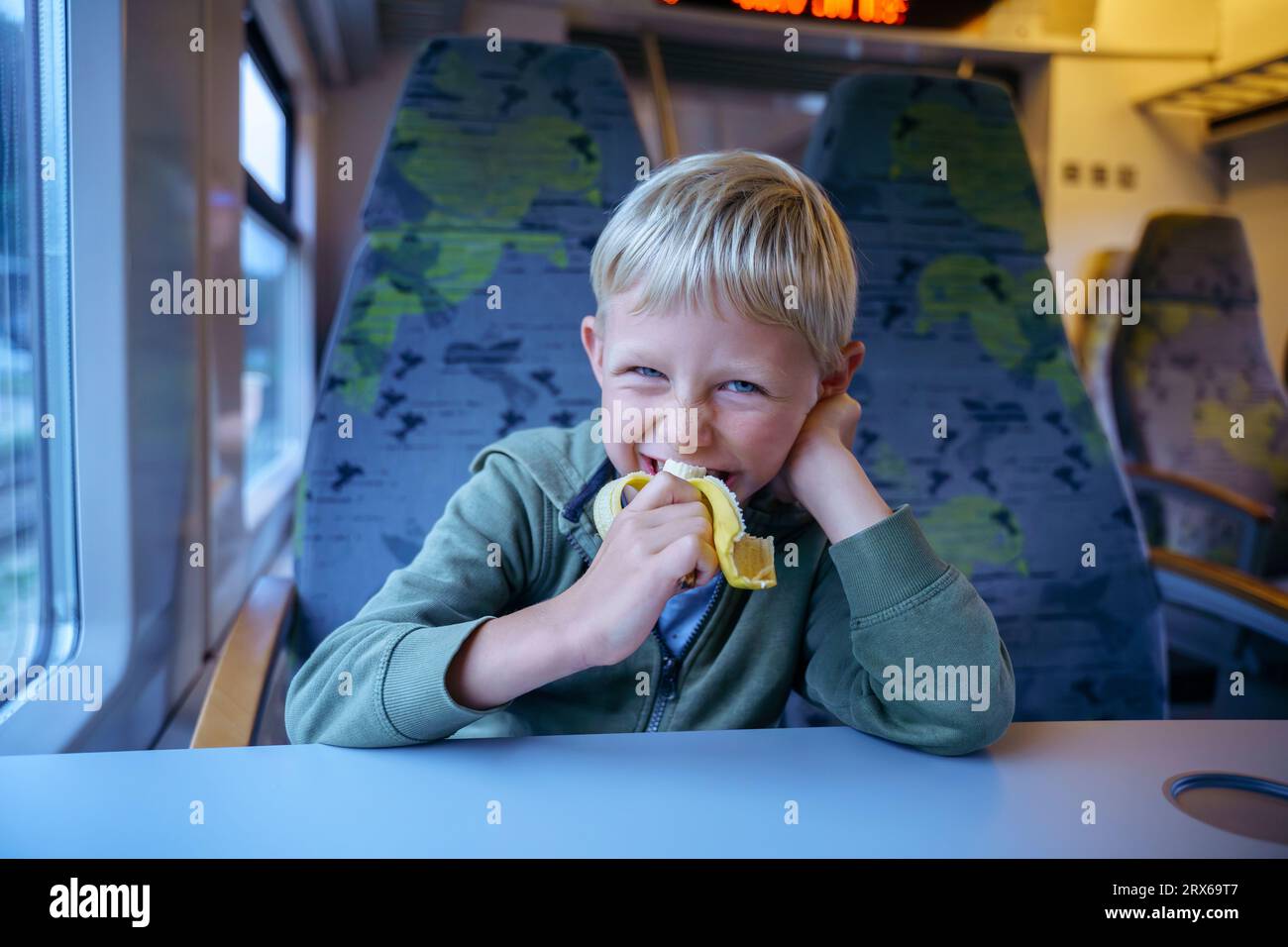 Eating in train hi-res stock photography and images - Alamy