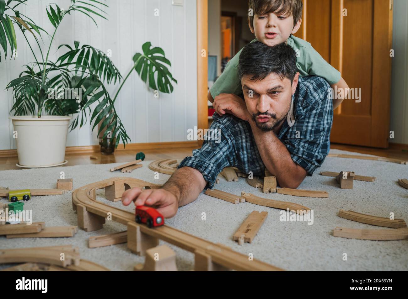 Boy father playing train hi-res stock photography and images - Alamy