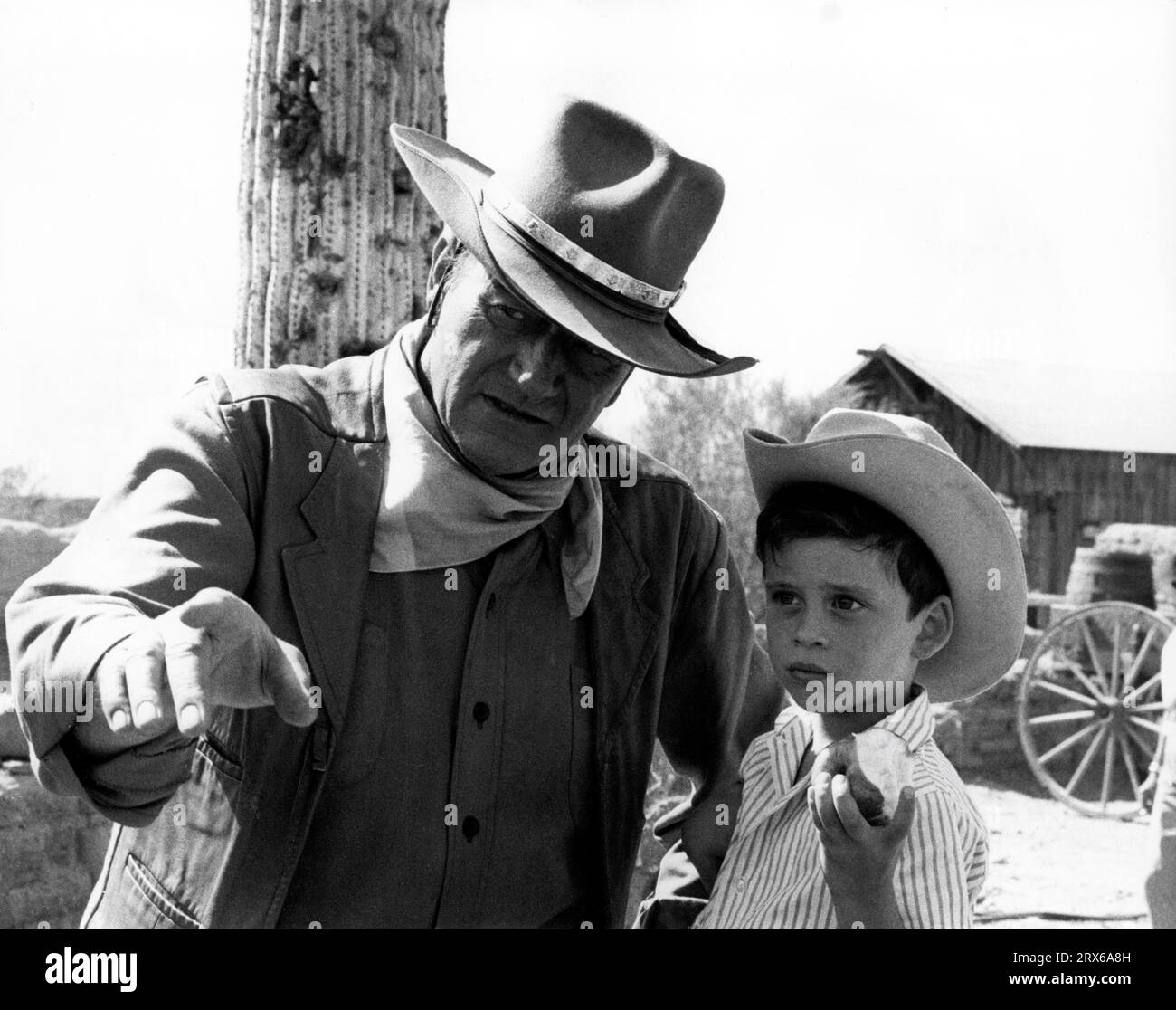 JOHN WAYNE and his son JOHN ETHAN WAYNE on set location candid near ...