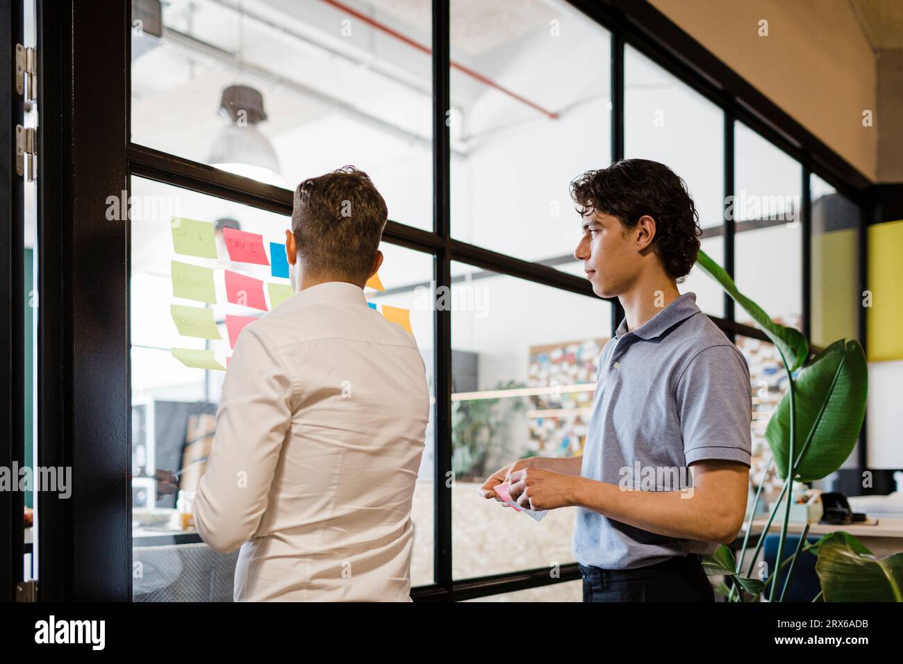 Businessmen planning strategy at office Stock Photo - Alamy