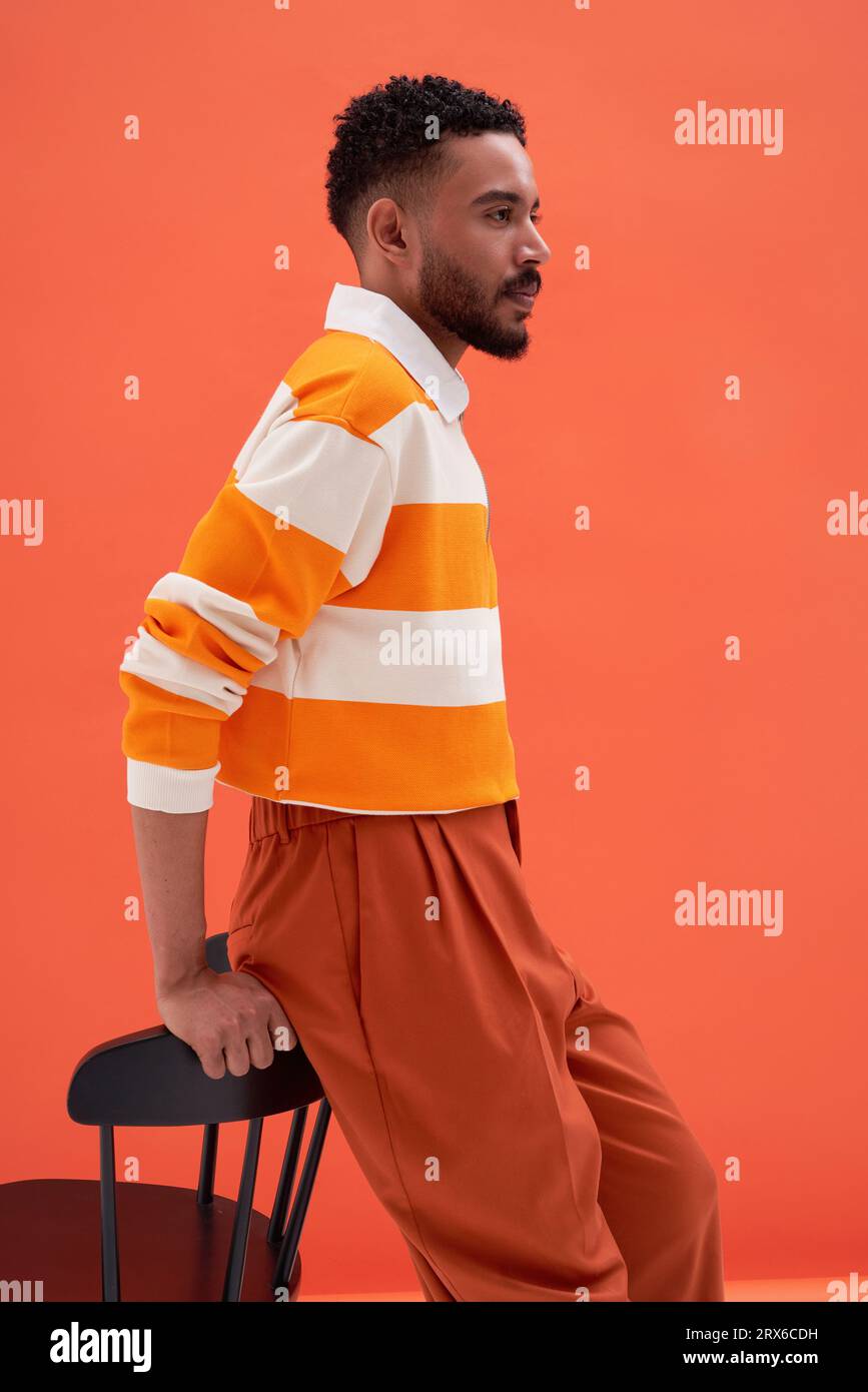 Man leaning chair hi-res stock photography and images - Alamy