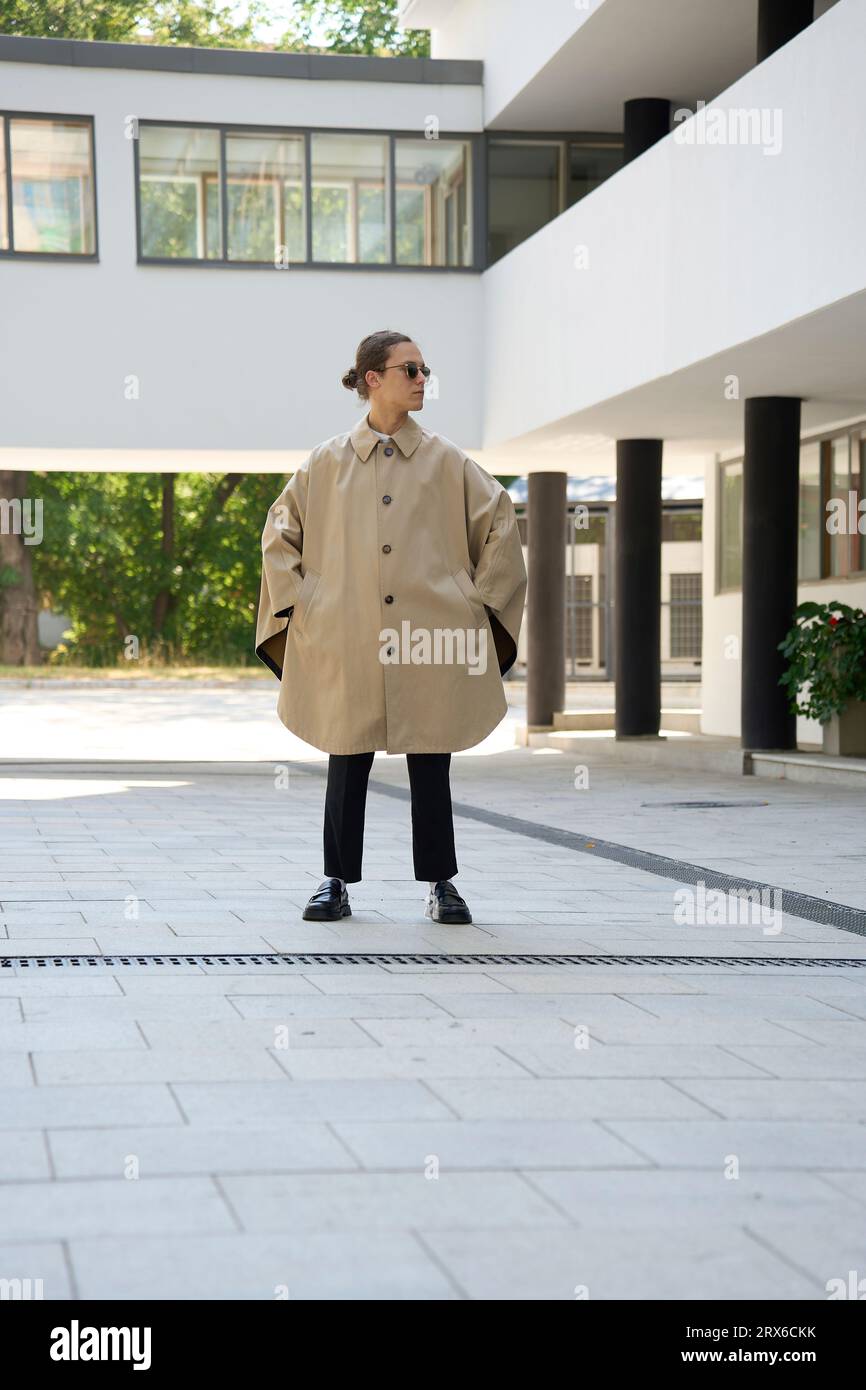 Building exterior architecture standing sunglasses hi-res stock ...