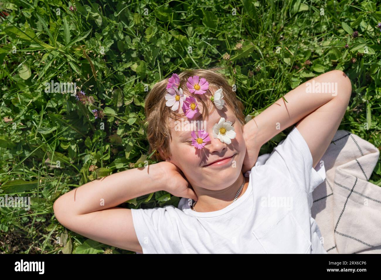 Happy children flowers back view hi-res stock photography and images ...