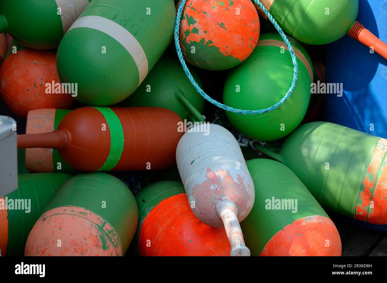 Floats/buoys arranged on docks in Nova Scotia Stock Photo - Alamy