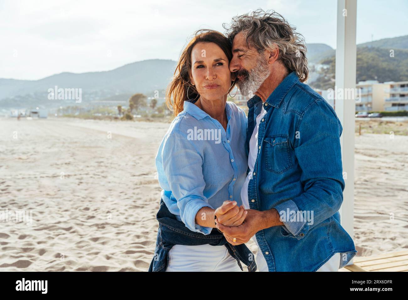 Senior man with eyes closed dancing with woman at beach Stock Photo - Alamy