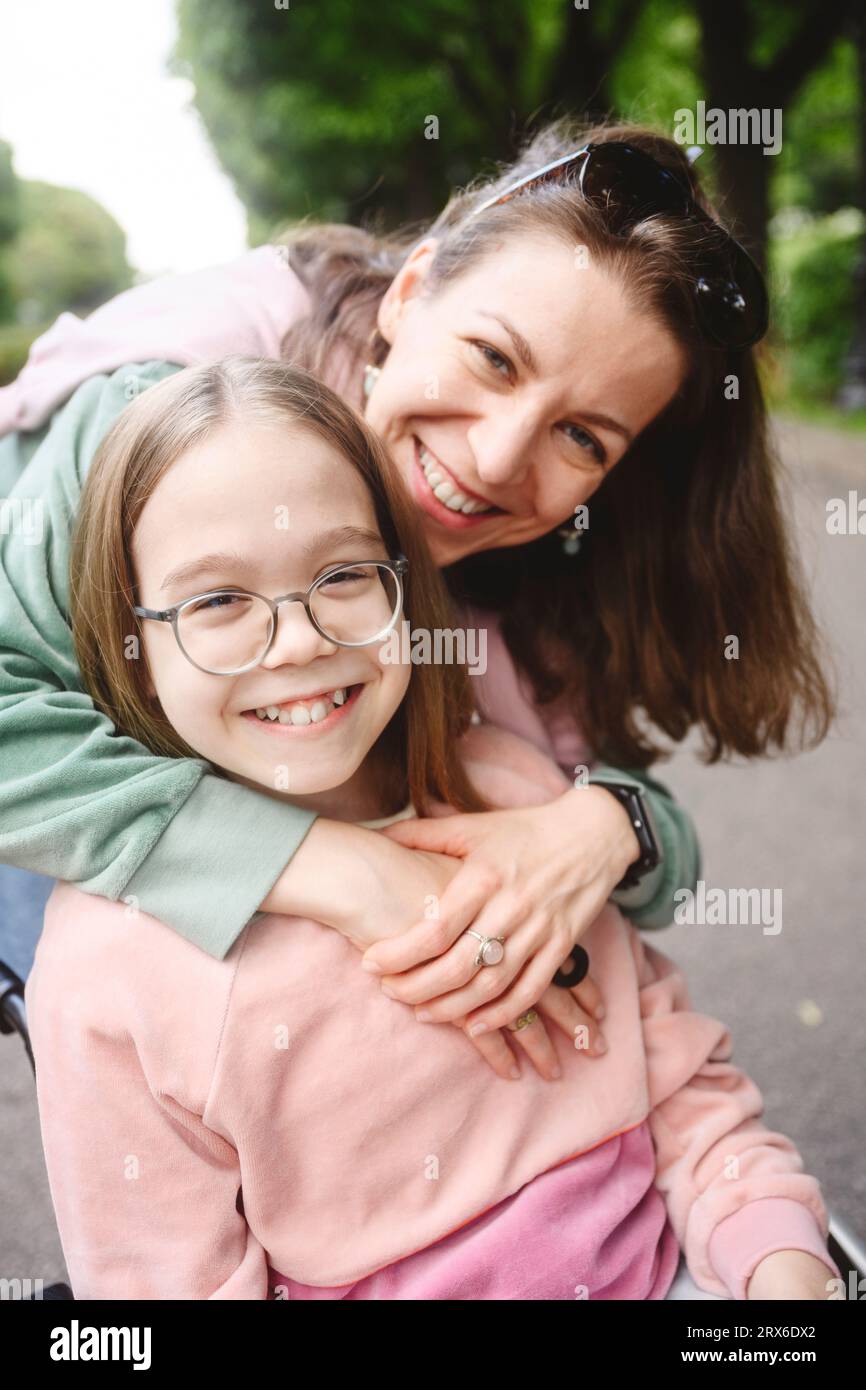Portrait mother hugging daughter in hi-res stock photography and images - Alamy