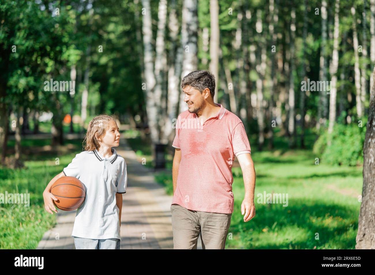 Two men boy walking in hi-res stock photography and images - Alamy