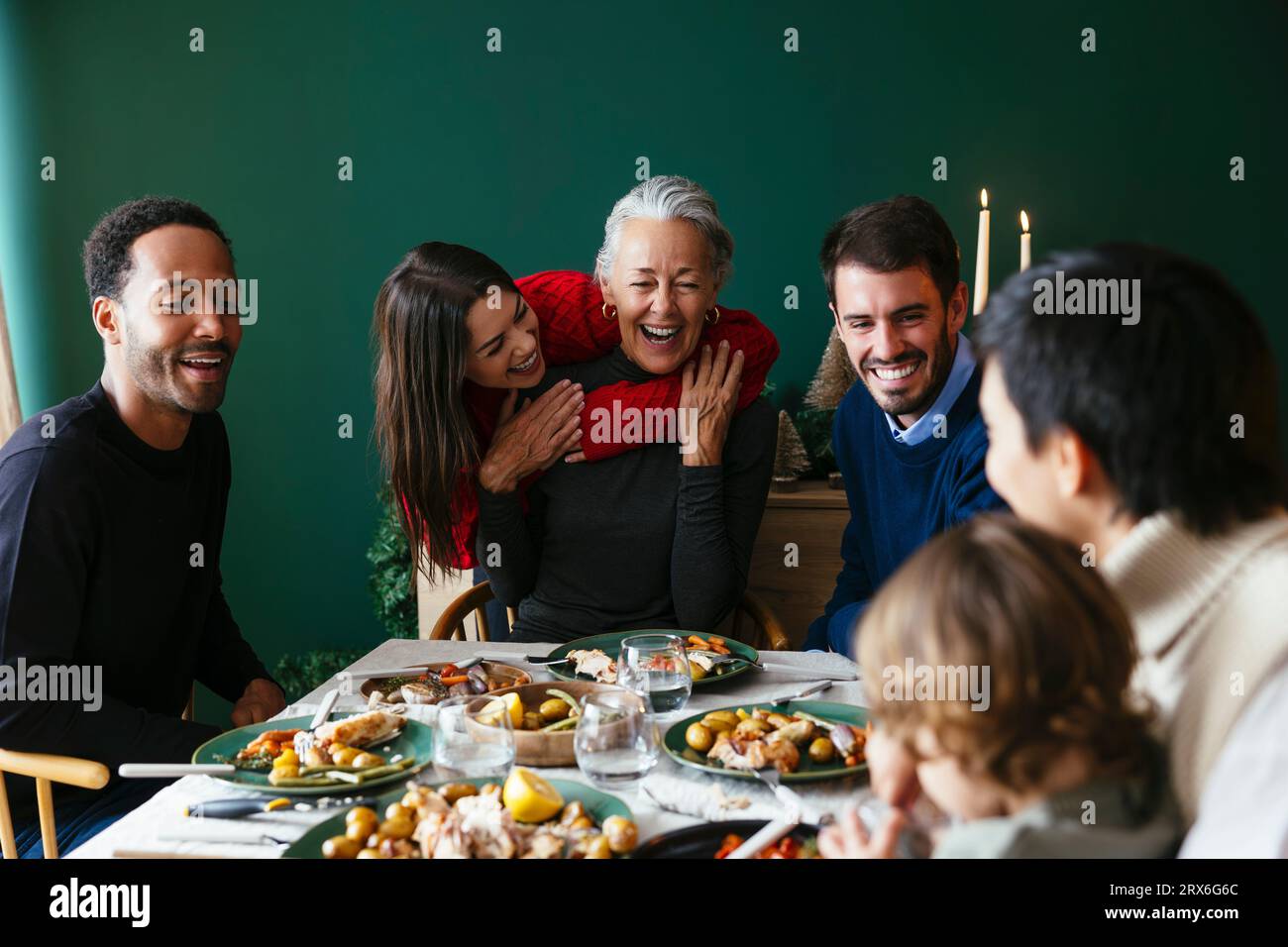 Multiracial family dinner hi-res stock photography and images - Alamy