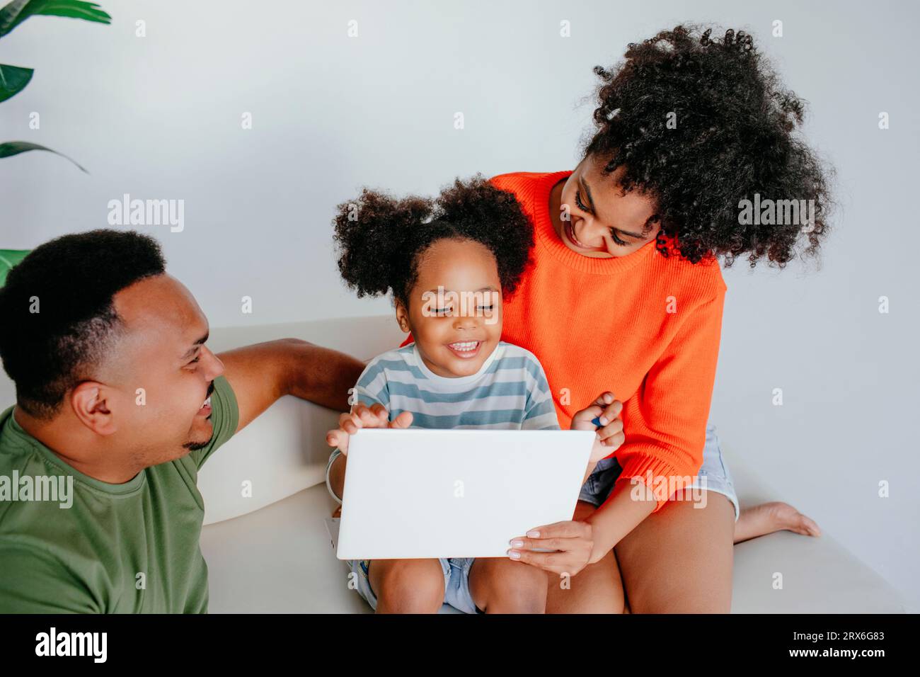African american father daughter using hi-res stock photography and ...