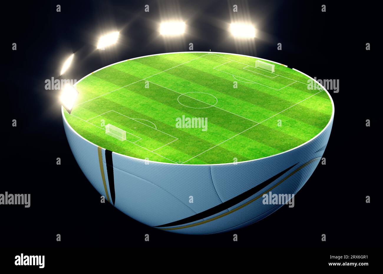 A soccer ball split in half revealing a marked green grass football ...