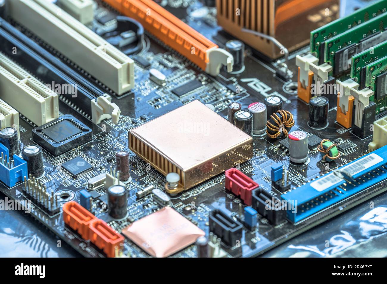 Close-up of computer mother board with radiator in center Stock Photo ...